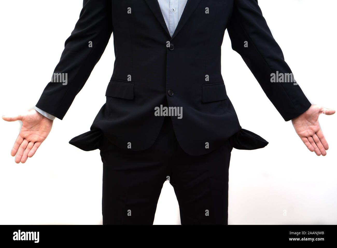 Business man in a suit showing his empty pockets Stock Photo - Alamy