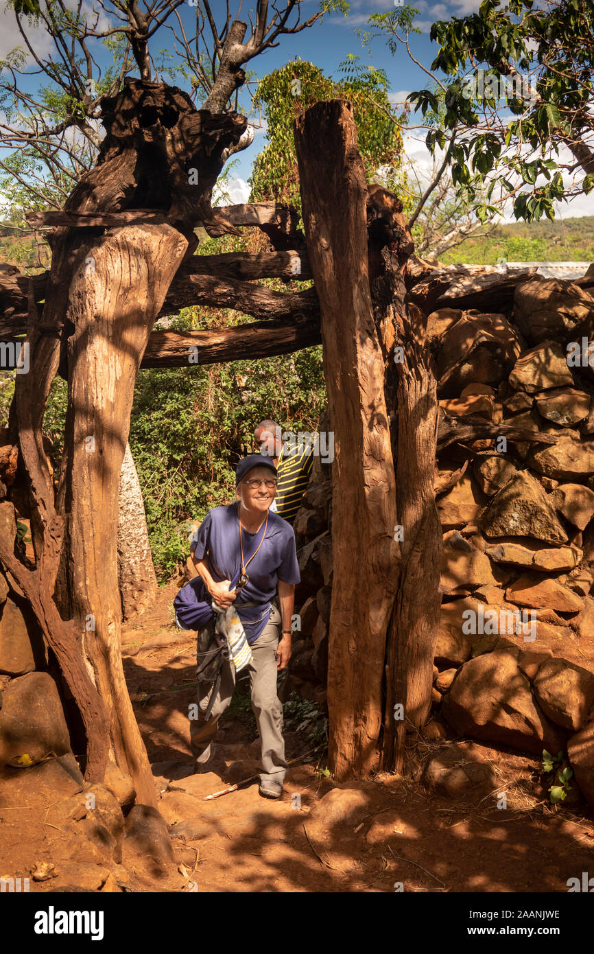 Ethiopia, Karat-Konso, Gamole walled village, senior female tourist ...