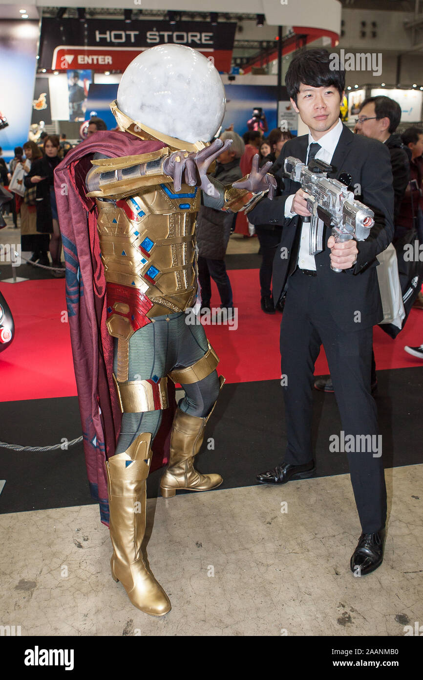 Chiba, Japan. 22nd Nov, 2019. Cosplayers pose for a photograph during ...