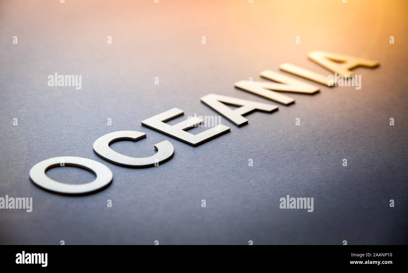 Word Oceania written with white solid letters on a board Stock Photo ...