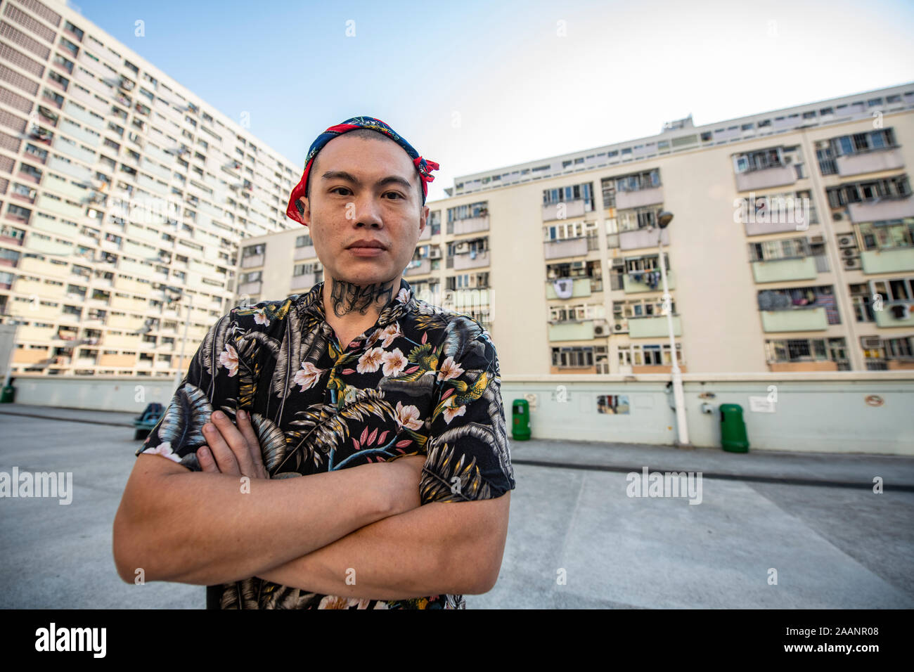 A young Chinese man outside the apartments in the Choi Hung Estate in ...