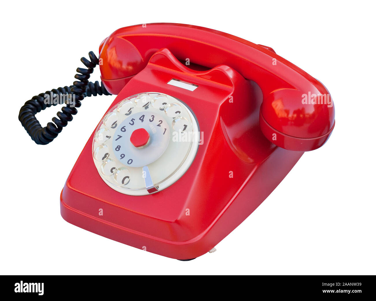 Old red plastic analog telephone on a white background for easy ...
