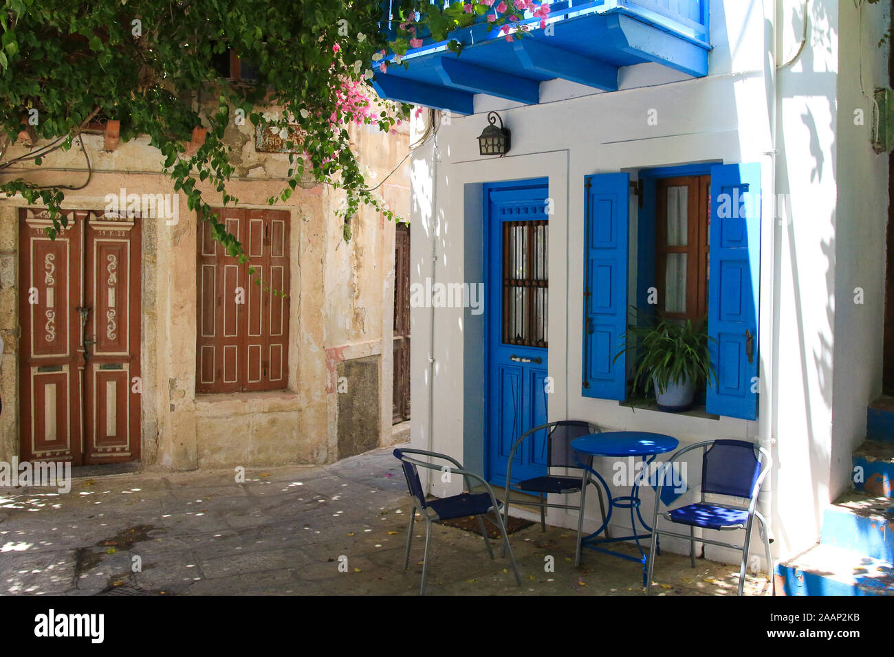typical red blue white buildings greek Stock Photo - Alamy