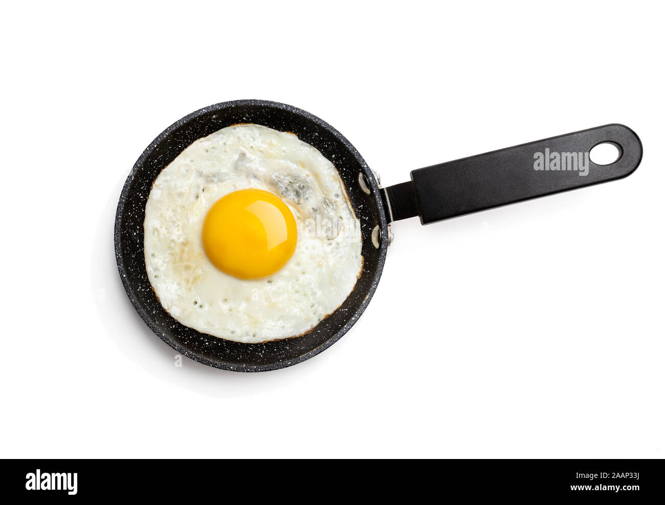 Frying egg on hot pan Cut Out Stock Images & Pictures - Alamy