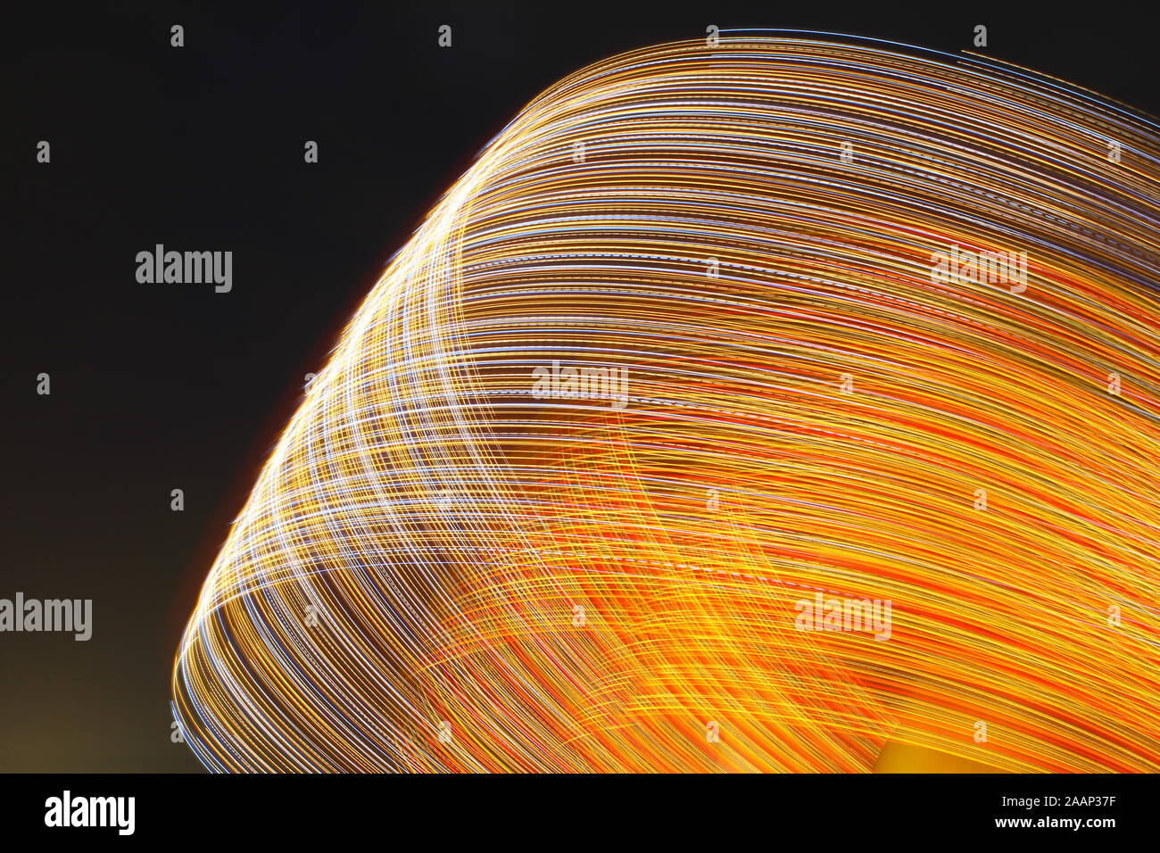 multiple layers of light swirl trail circling at high speed. ring trace ...