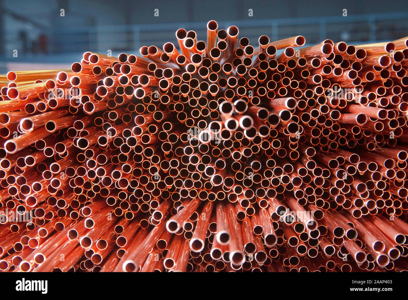 Copper pipes in factory, industrial background Stock Photo - Alamy