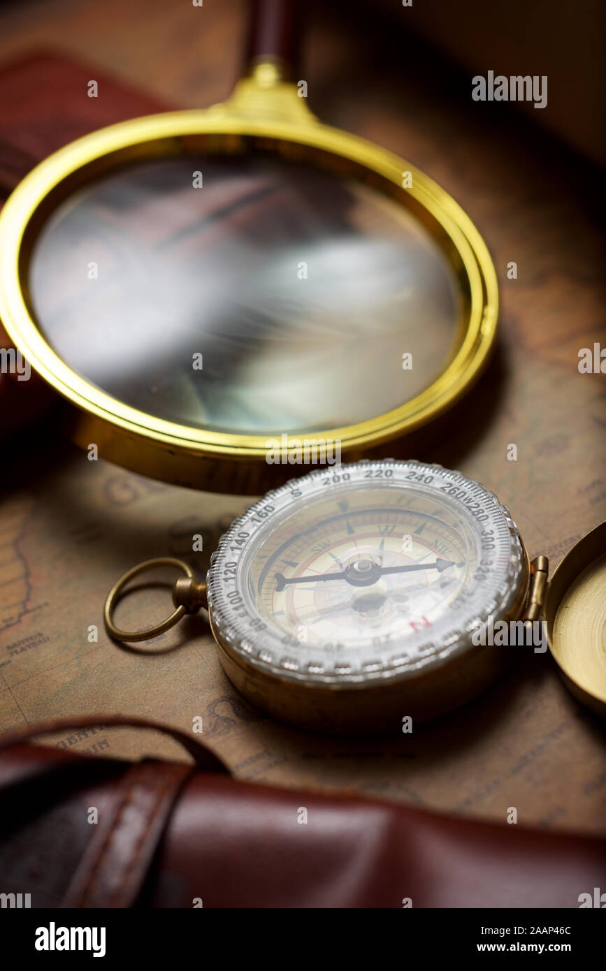 Vintage compass and old navigation map Stock Photo - Alamy