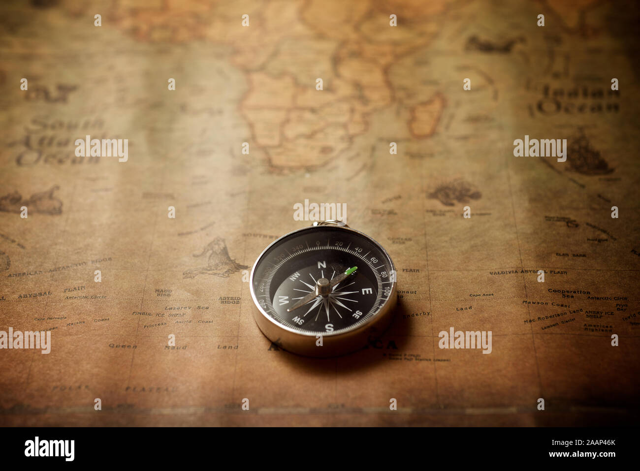 Vintage compass and old navigation map Stock Photo - Alamy