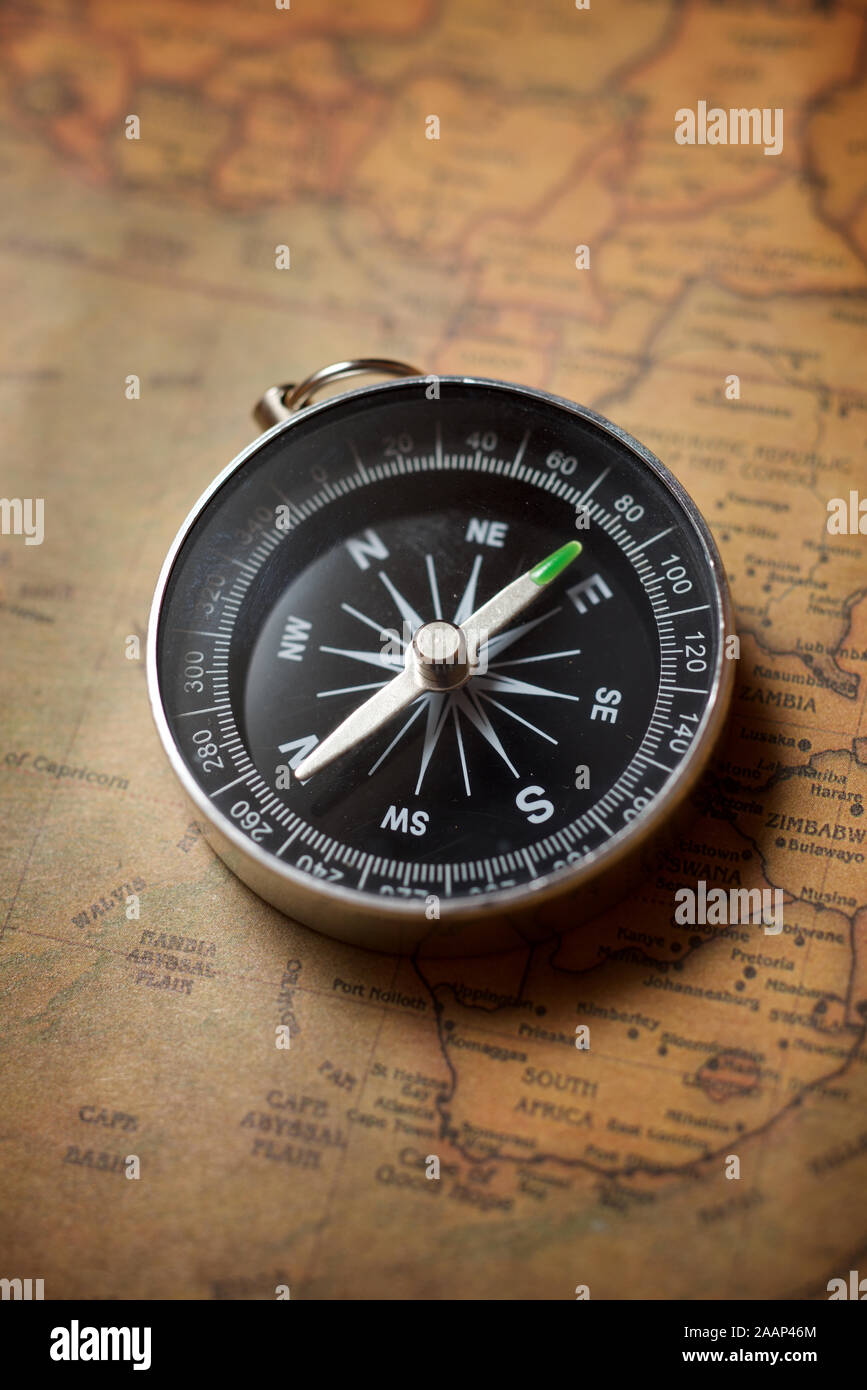 Vintage compass and old navigation map Stock Photo - Alamy