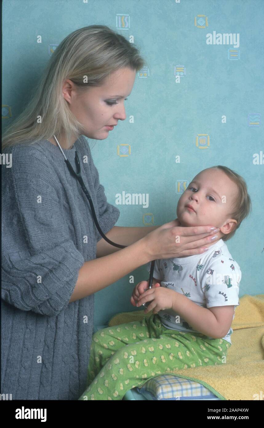 Baby getting Checkup Stock Photo - Alamy