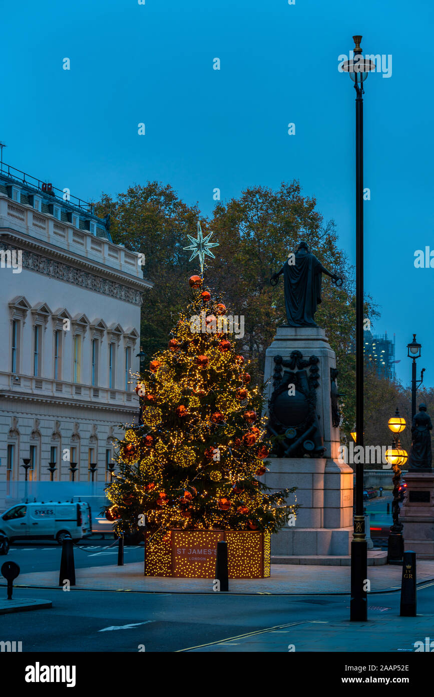 LONDON - NOVEMBER 21, 2019: Christmas tree at Waterloo Place opposite ...