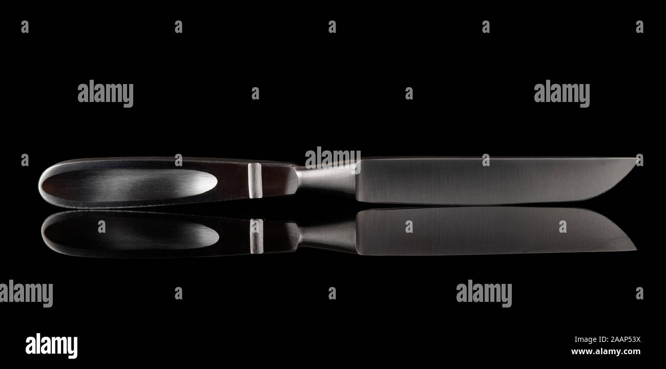 Liston amputation knife shot on black surface with reflection Stock ...