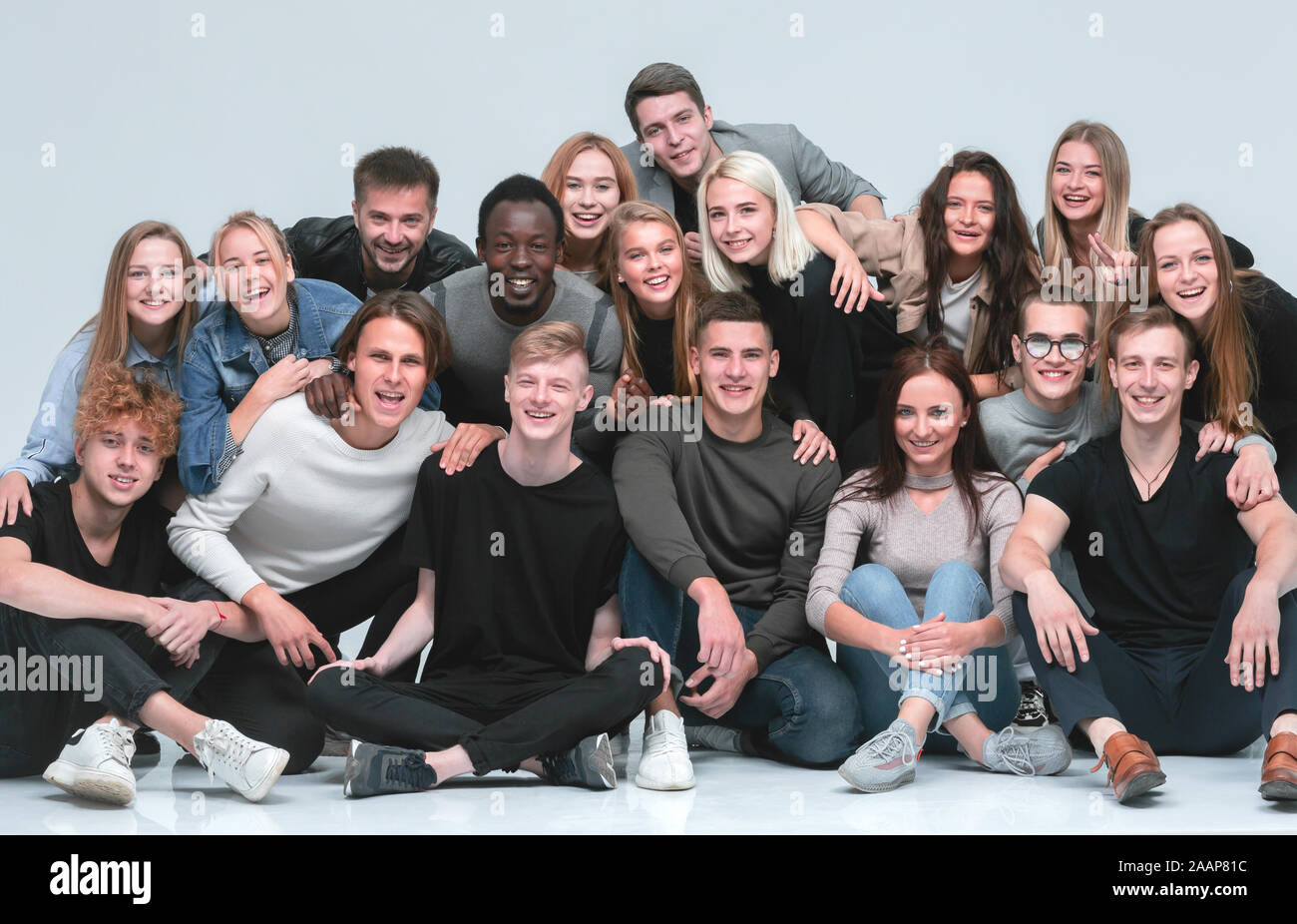 big group of friends hugging each other Stock Photo - Alamy