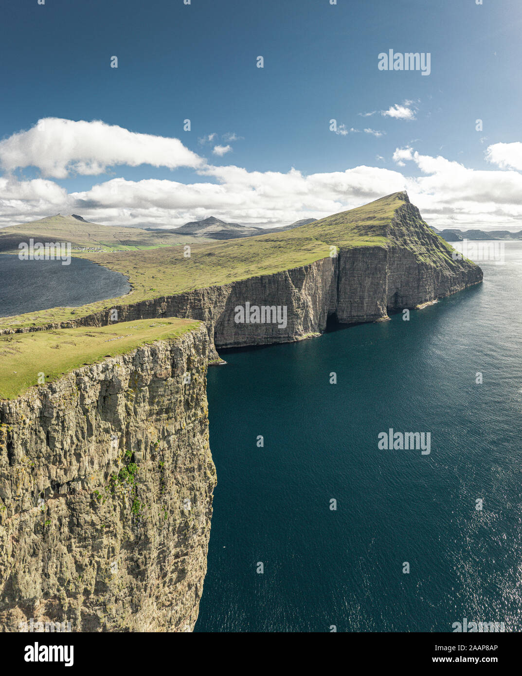 Cliffs in Leitisvatn lake and Sorvagsvatn on Vagar island aerial view ...