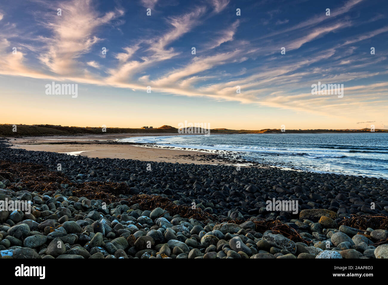 Dunstanburgh Castle & Rocks Stock Photo - Alamy