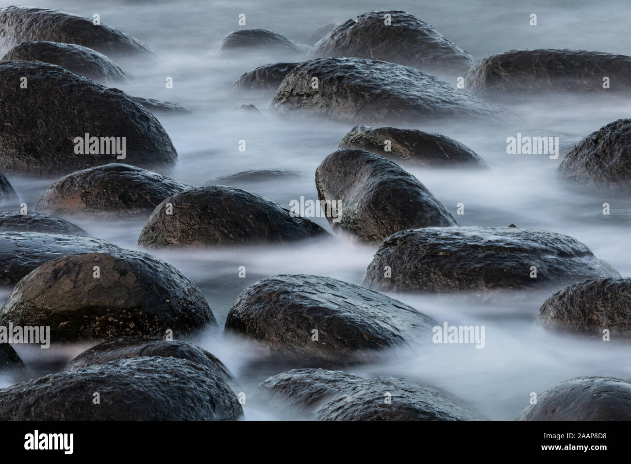 Dunstanburgh Castle & Rocks Stock Photo - Alamy