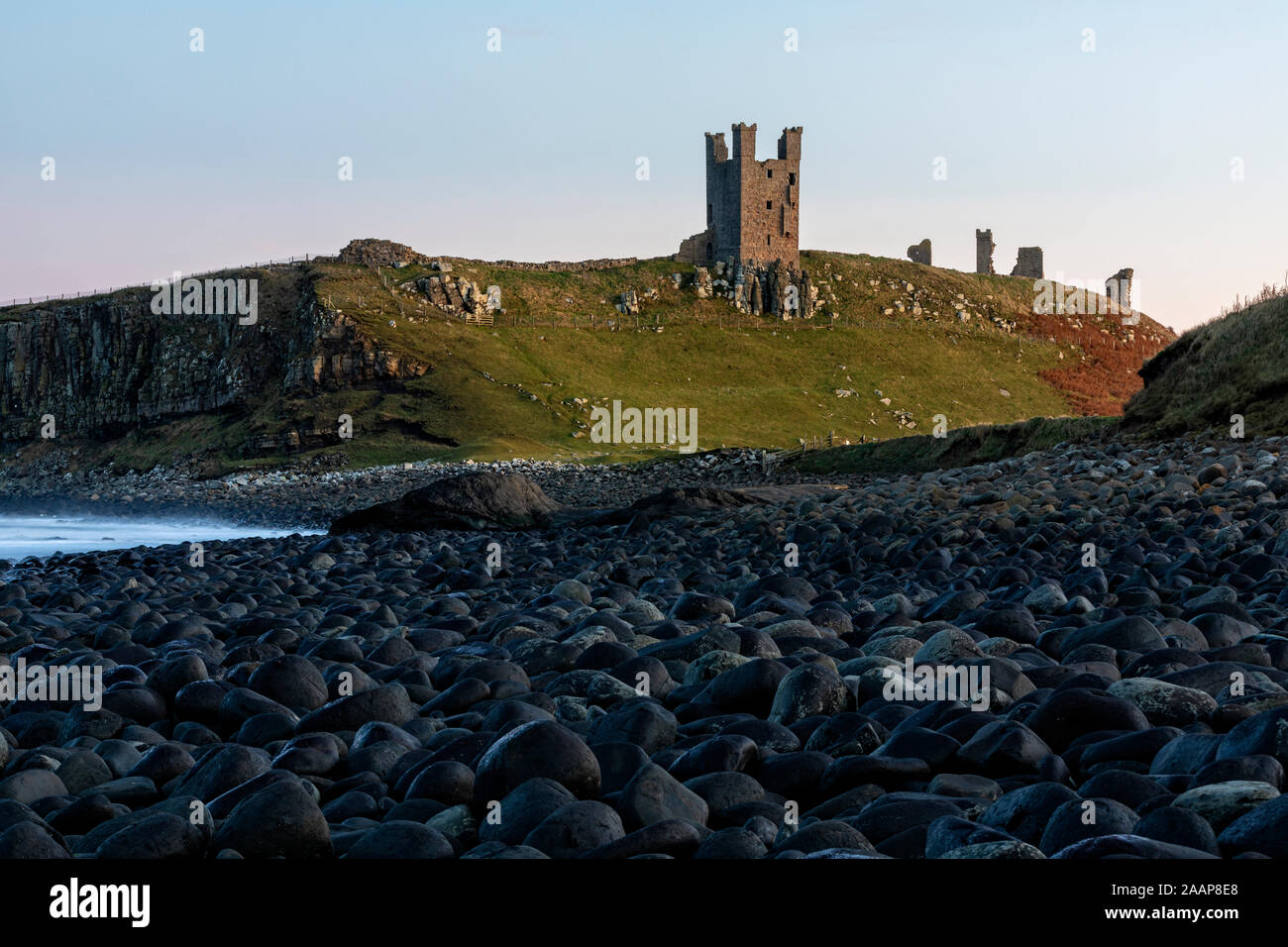 Dunstanburgh Castle & Rocks Stock Photo - Alamy