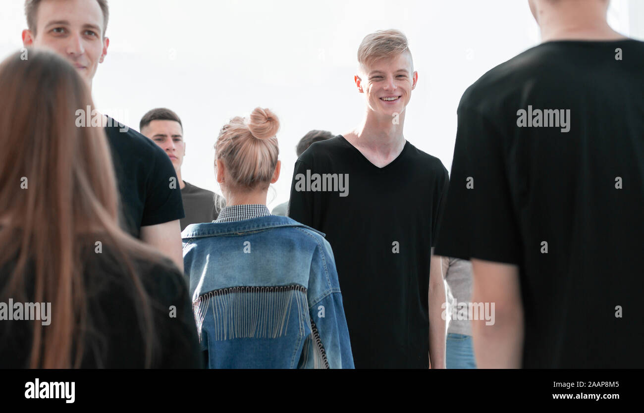 casual young people walk past each other Stock Photo - Alamy