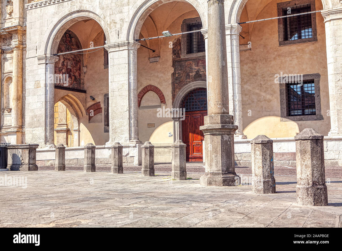 pedestrian street with columns and balustrade in old italian town Stock ...