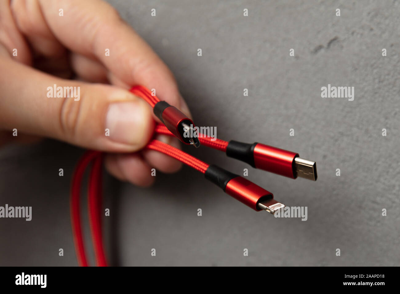 Three different kind of power and connection cable for smartphone ...