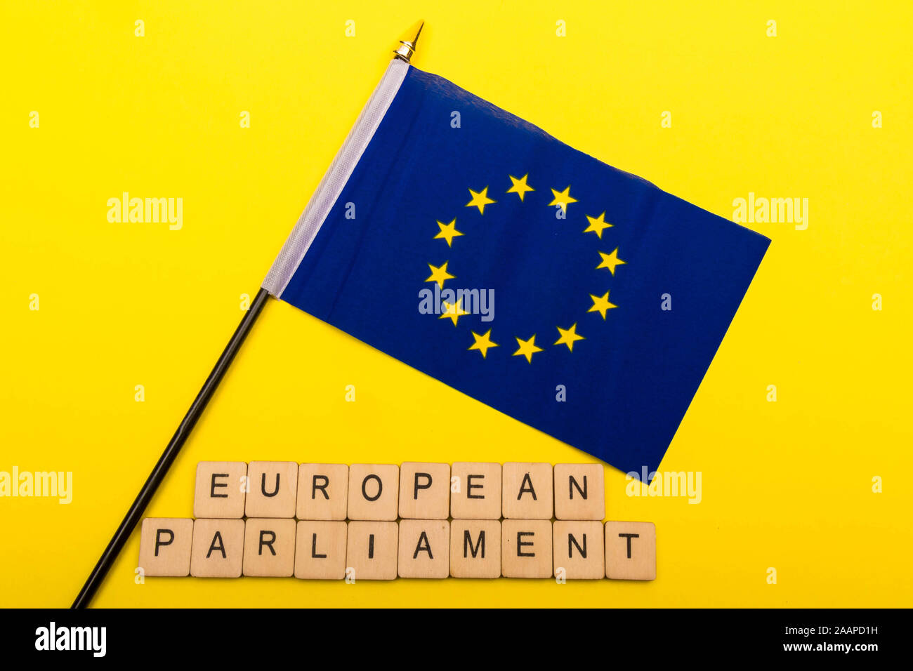 European union concept showing the flag of the EU on a yellow ...