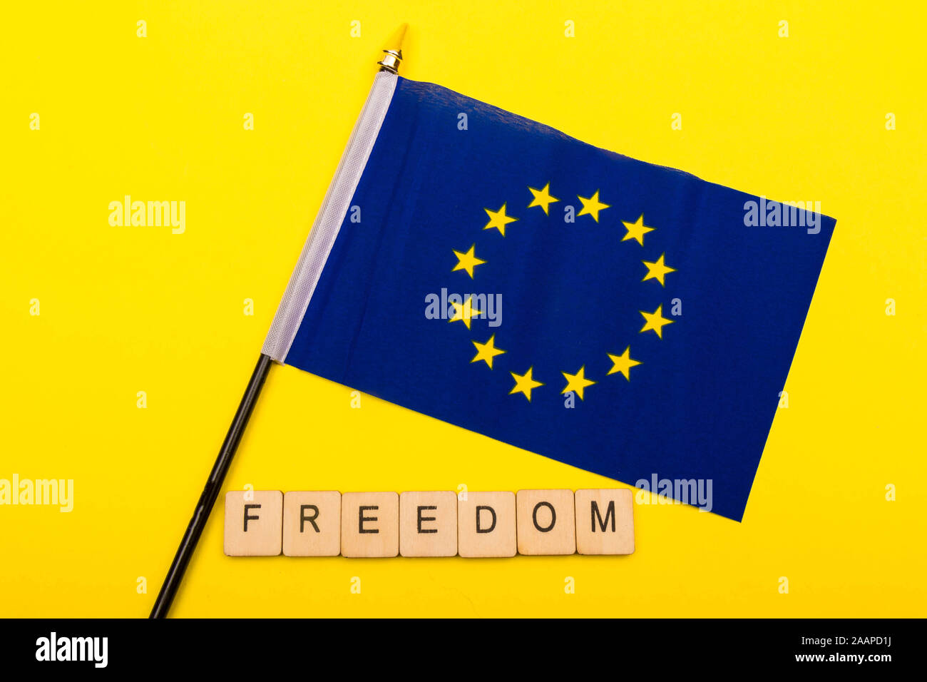 European union concept showing the flag of the EU on a yellow ...