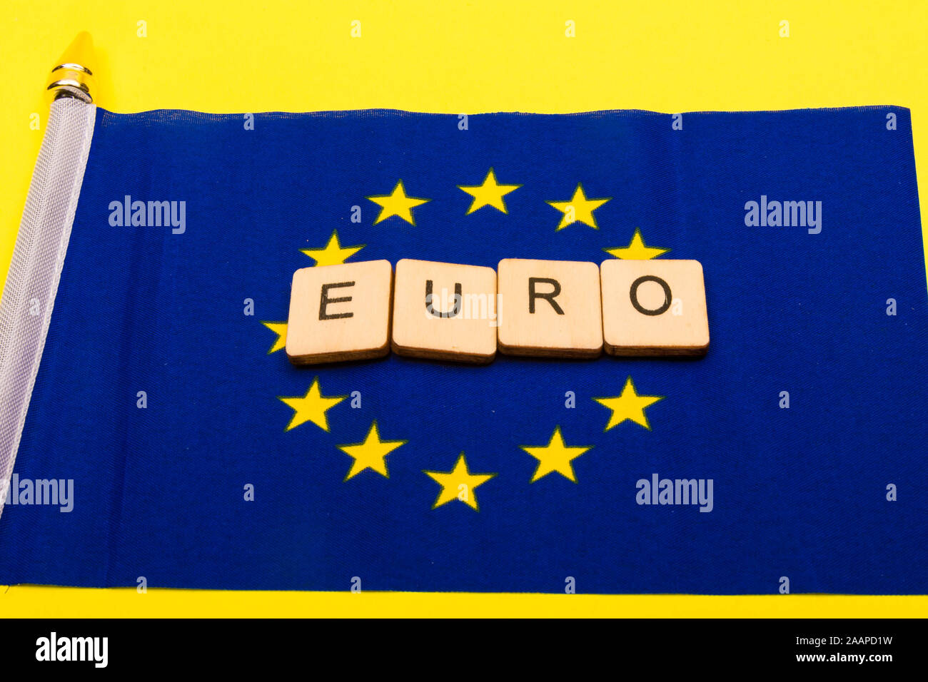 European union concept showing the flag of the EU on a yellow ...