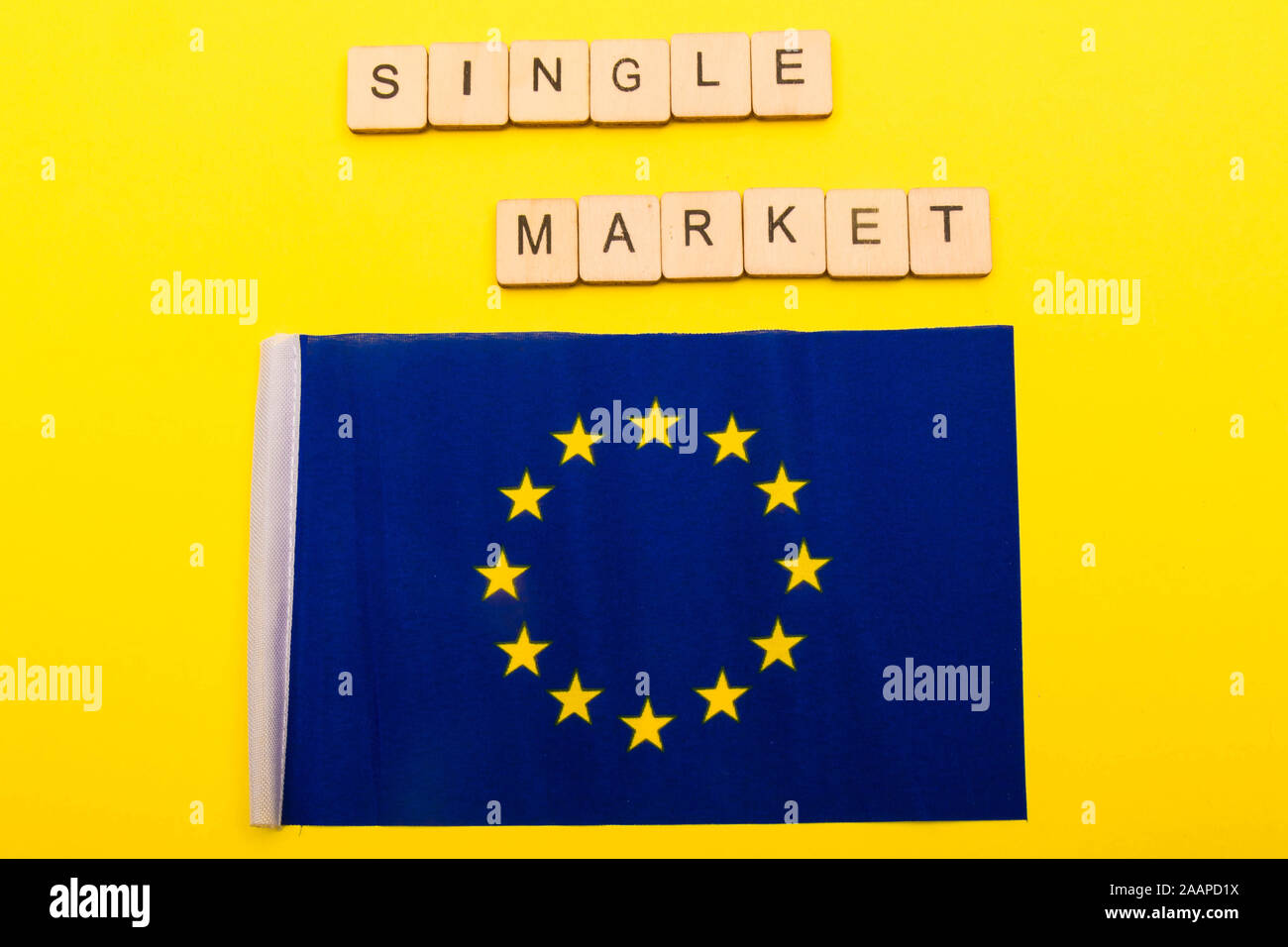 European union concept showing the flag of the EU on a yellow ...