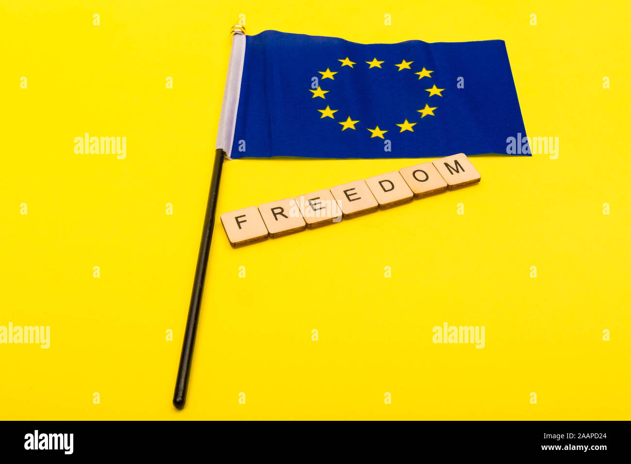 European union concept showing the flag of the EU on a yellow ...