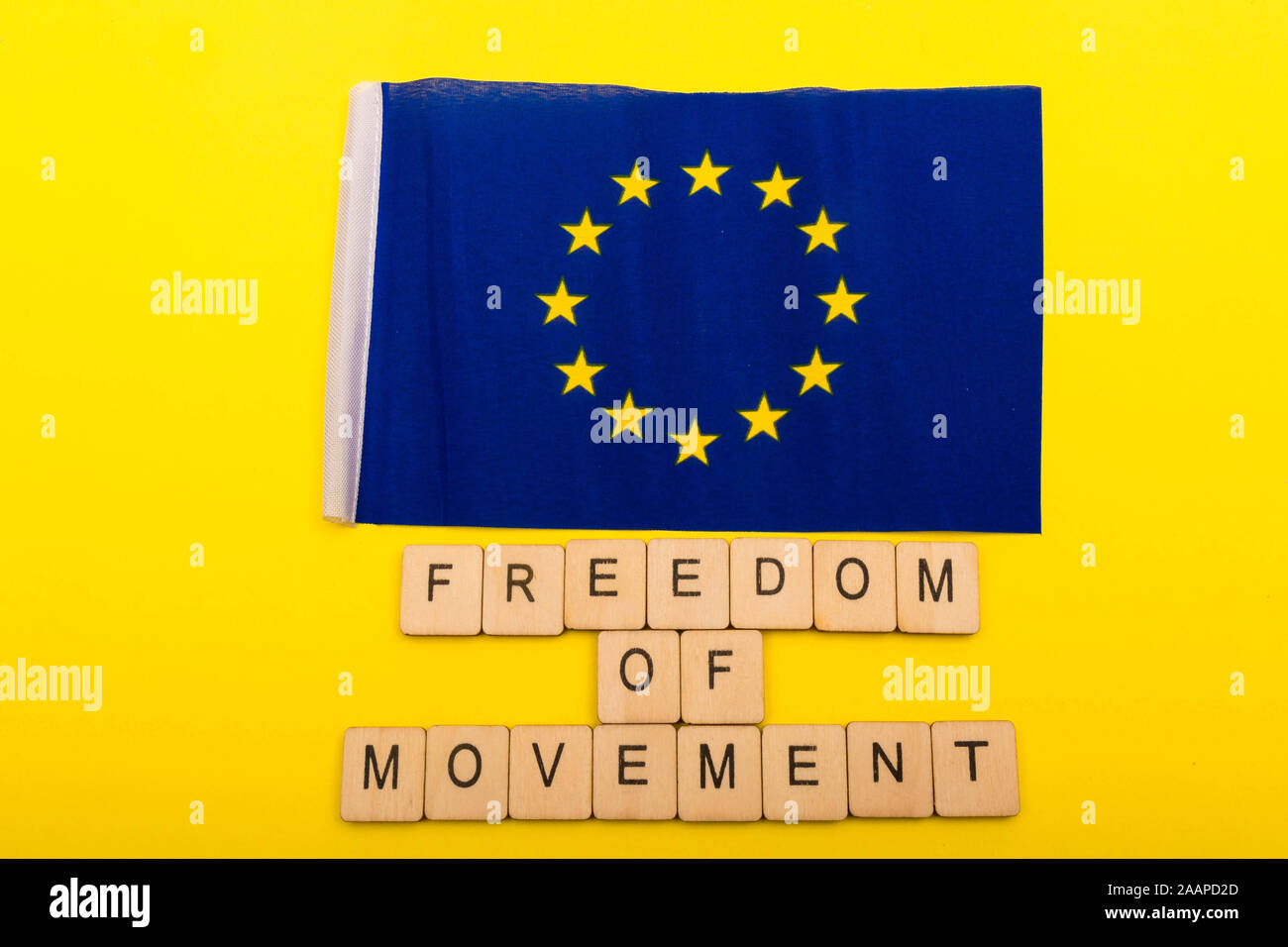European union concept showing the flag of the EU on a yellow ...