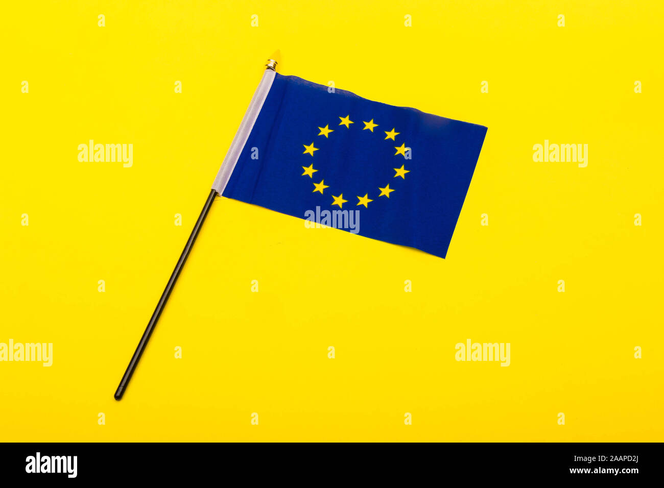 European union concept showing the flag of the EU on a yellow ...