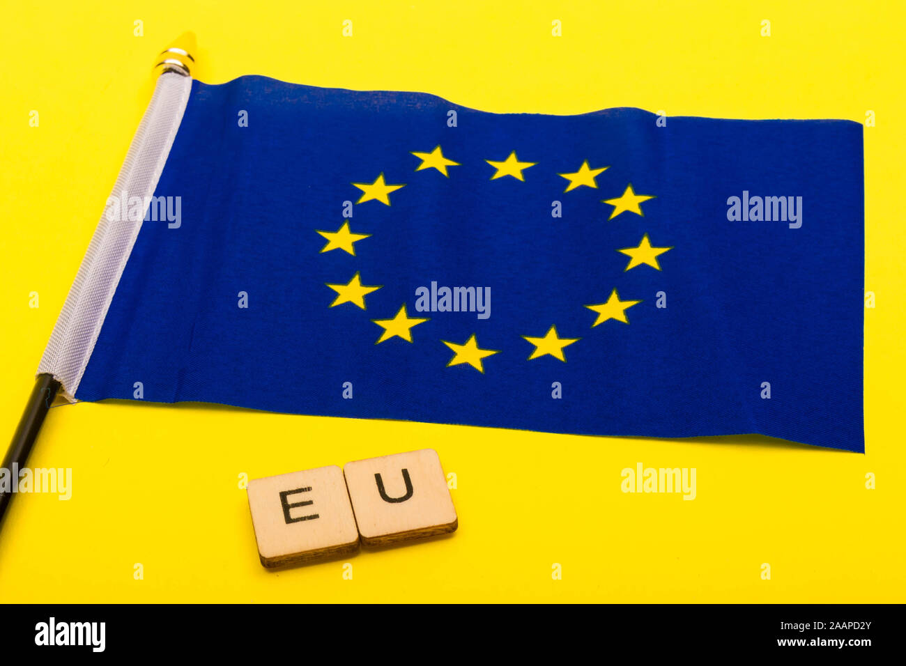 European union concept showing the flag of the EU on a yellow ...
