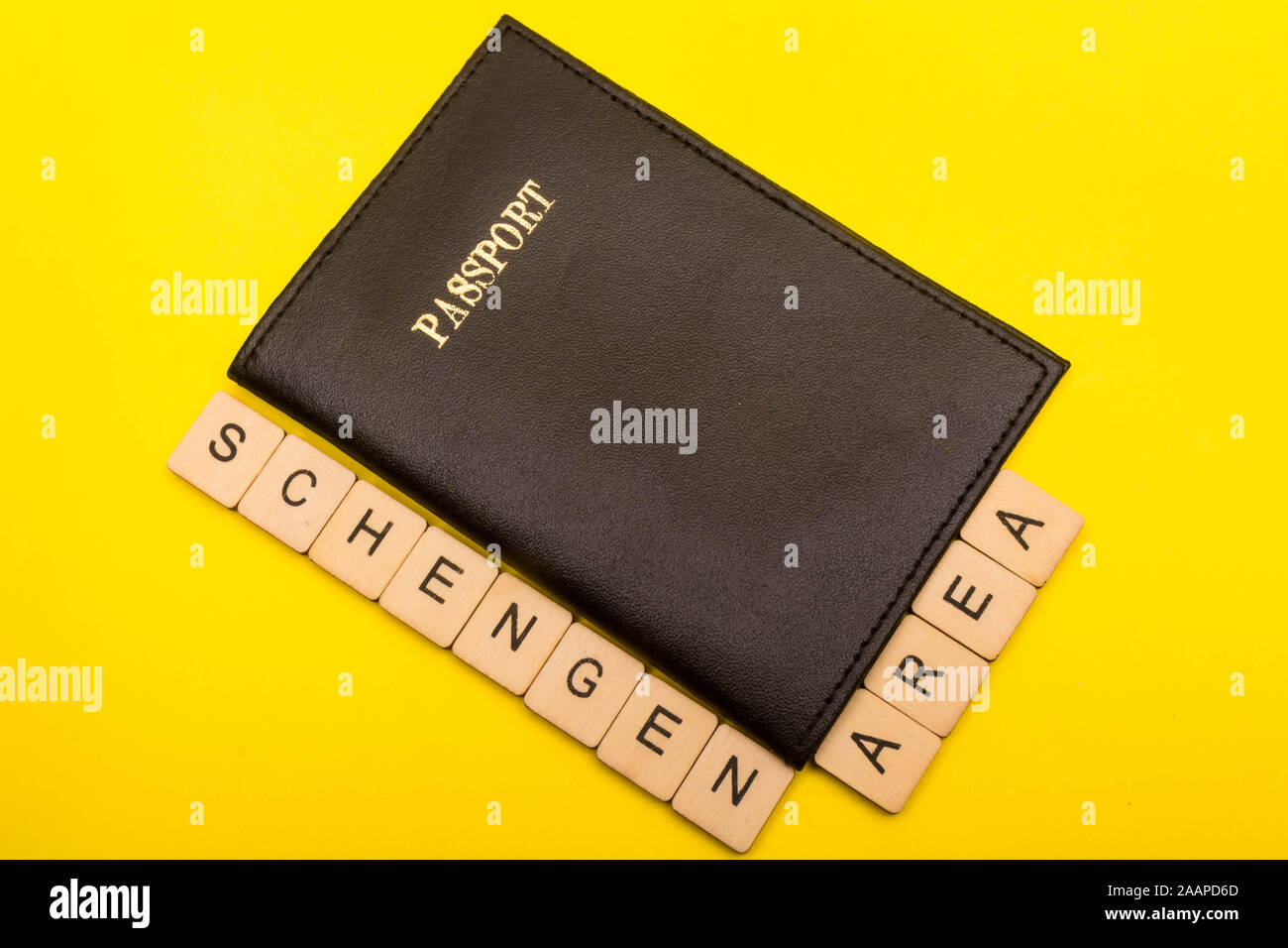 European union concept showing a passport a yellow background with a ...