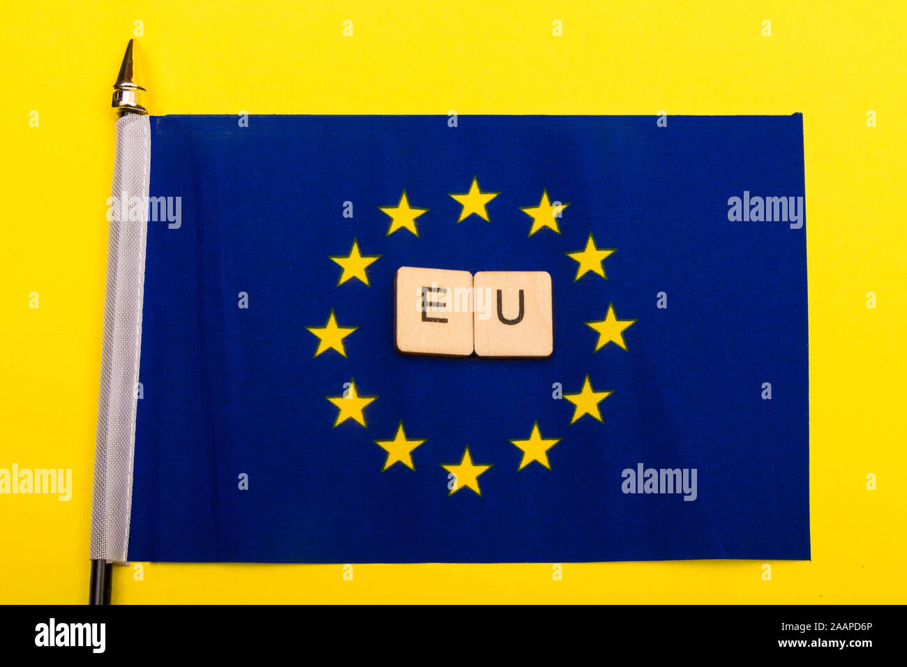 European union concept showing the flag of the EU on a yellow ...