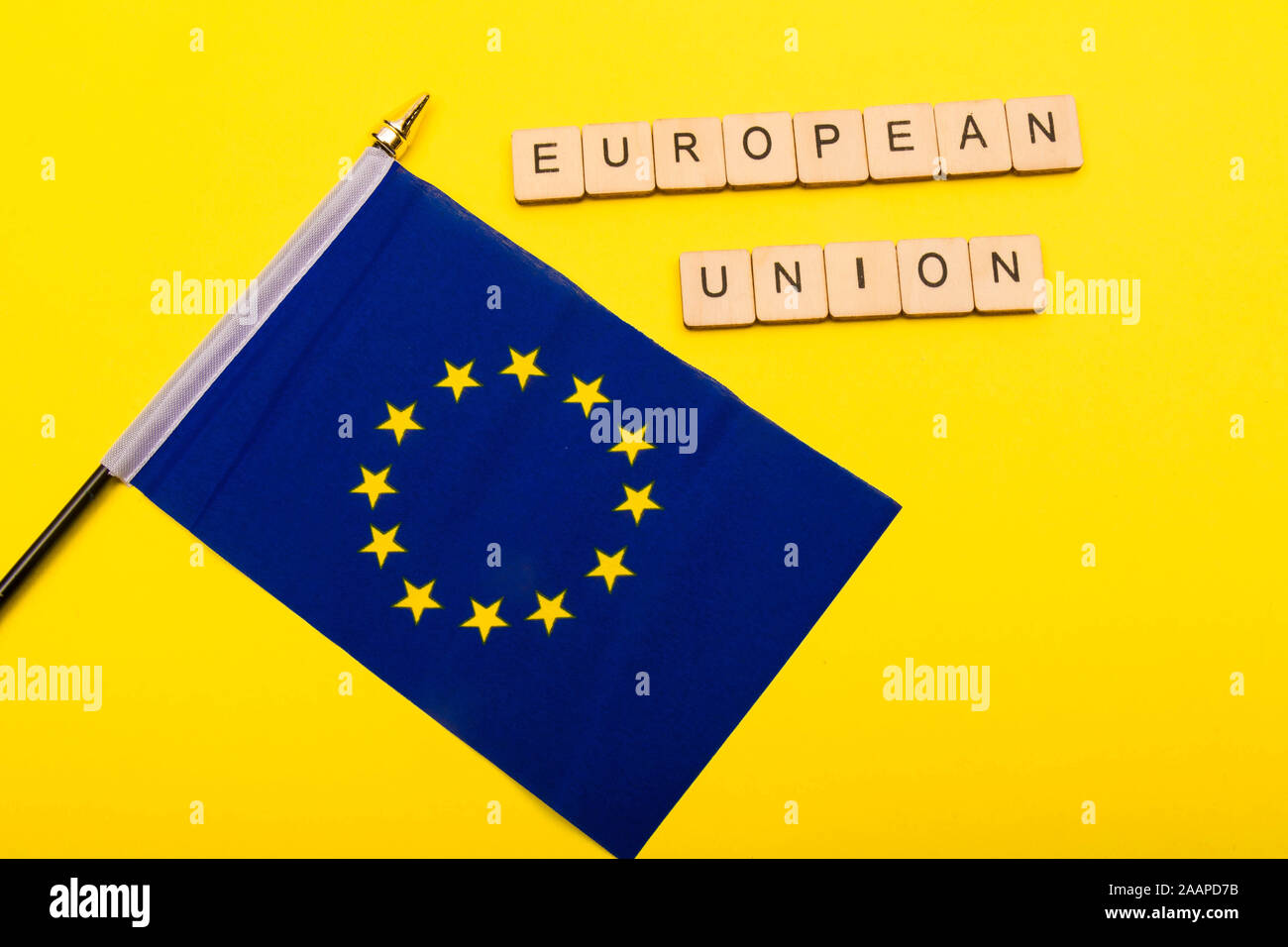 European union concept showing the flag of the EU on a yellow ...