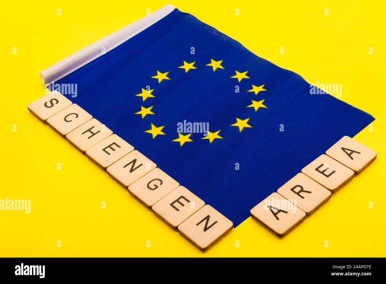 European union concept showing the flag of the EU on a yellow ...