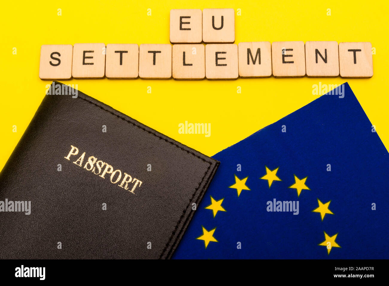 European union concept showing the flag of the EU and a passport on a ...