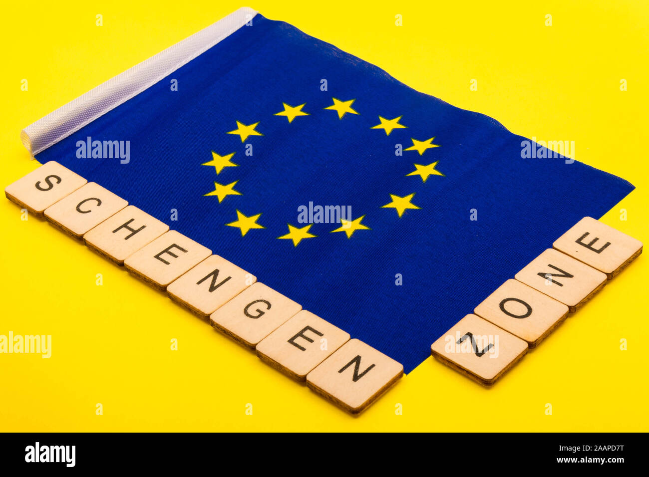 European union concept showing the flag of the EU on a yellow ...
