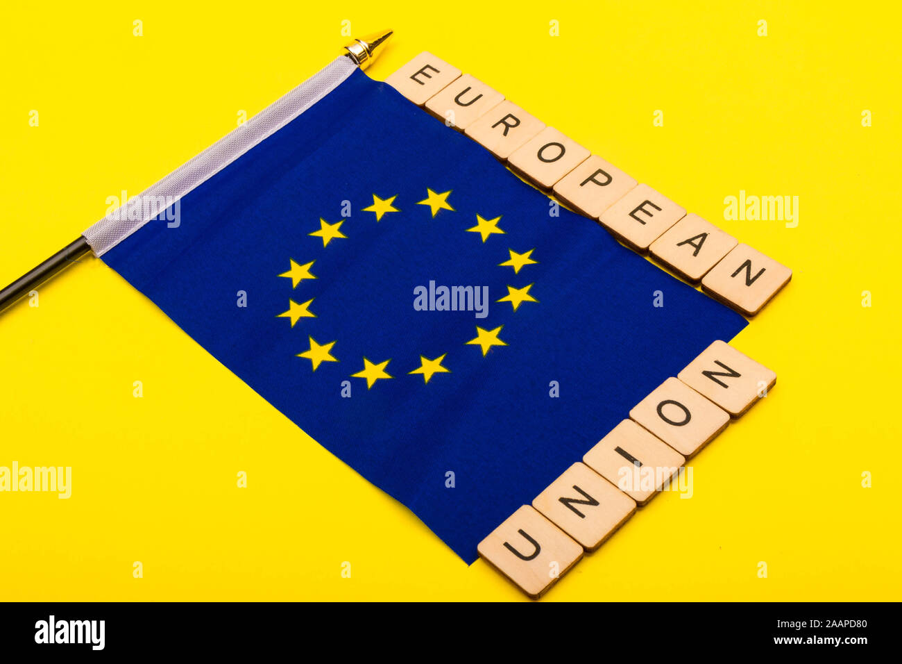 European union concept showing the flag of the EU on a yellow ...