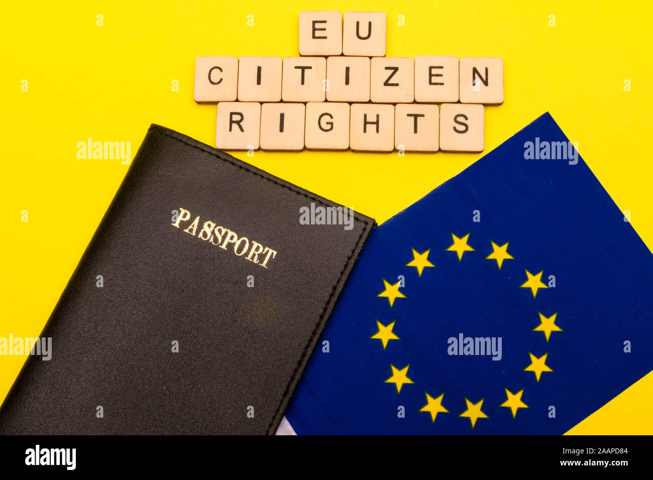 European union concept showing the flag of the EU and a passport on a ...