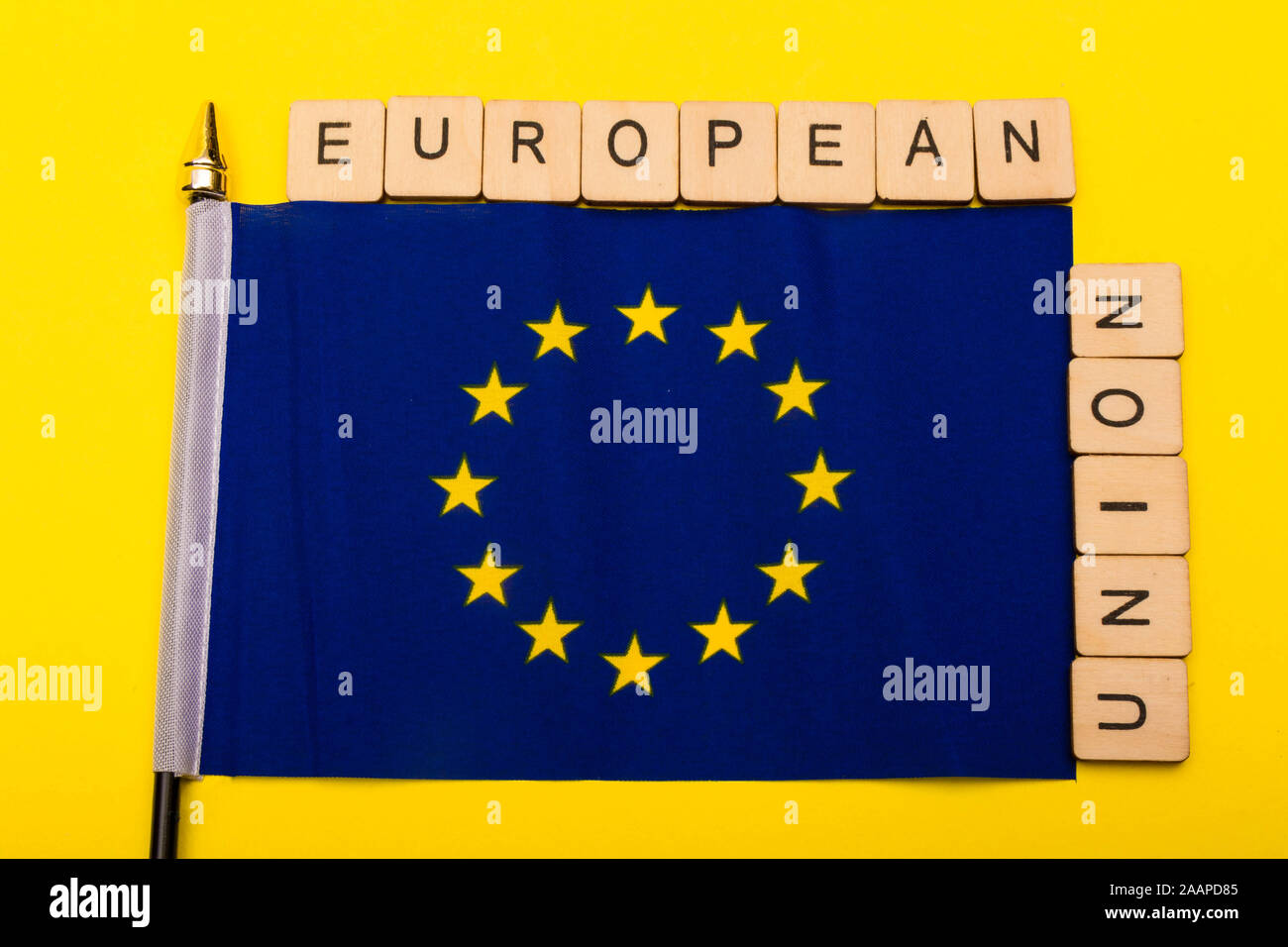 European union concept showing the flag of the EU on a yellow ...