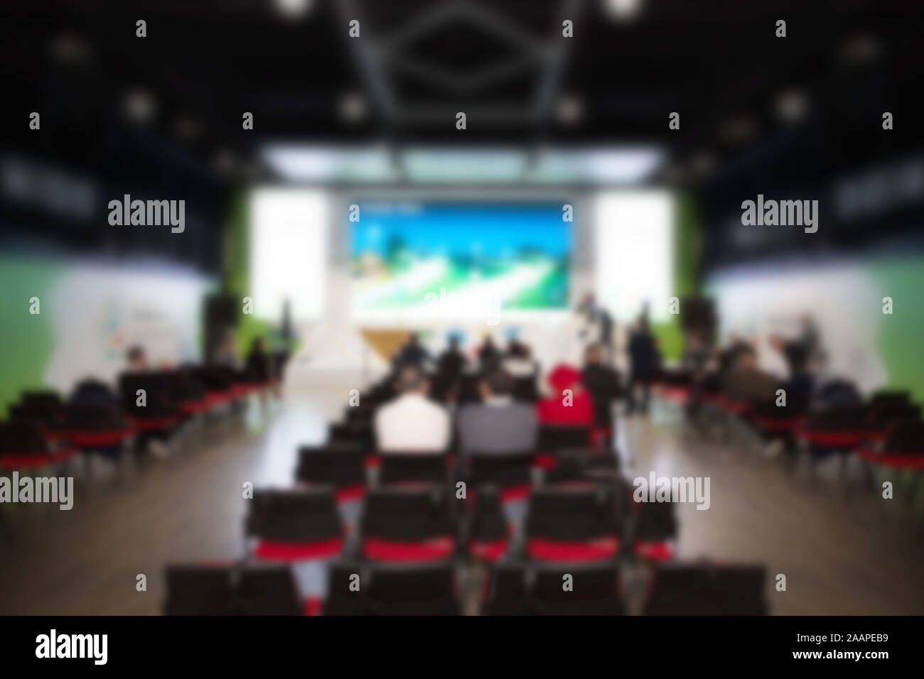 Blurred images of office staff are training to increase skills, work in ...