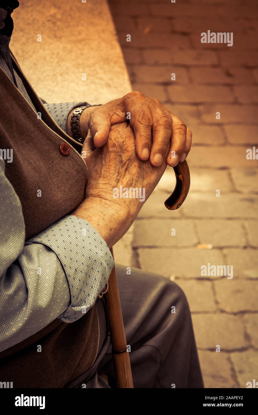 Hand old man walking stick hi-res stock photography and images - Alamy