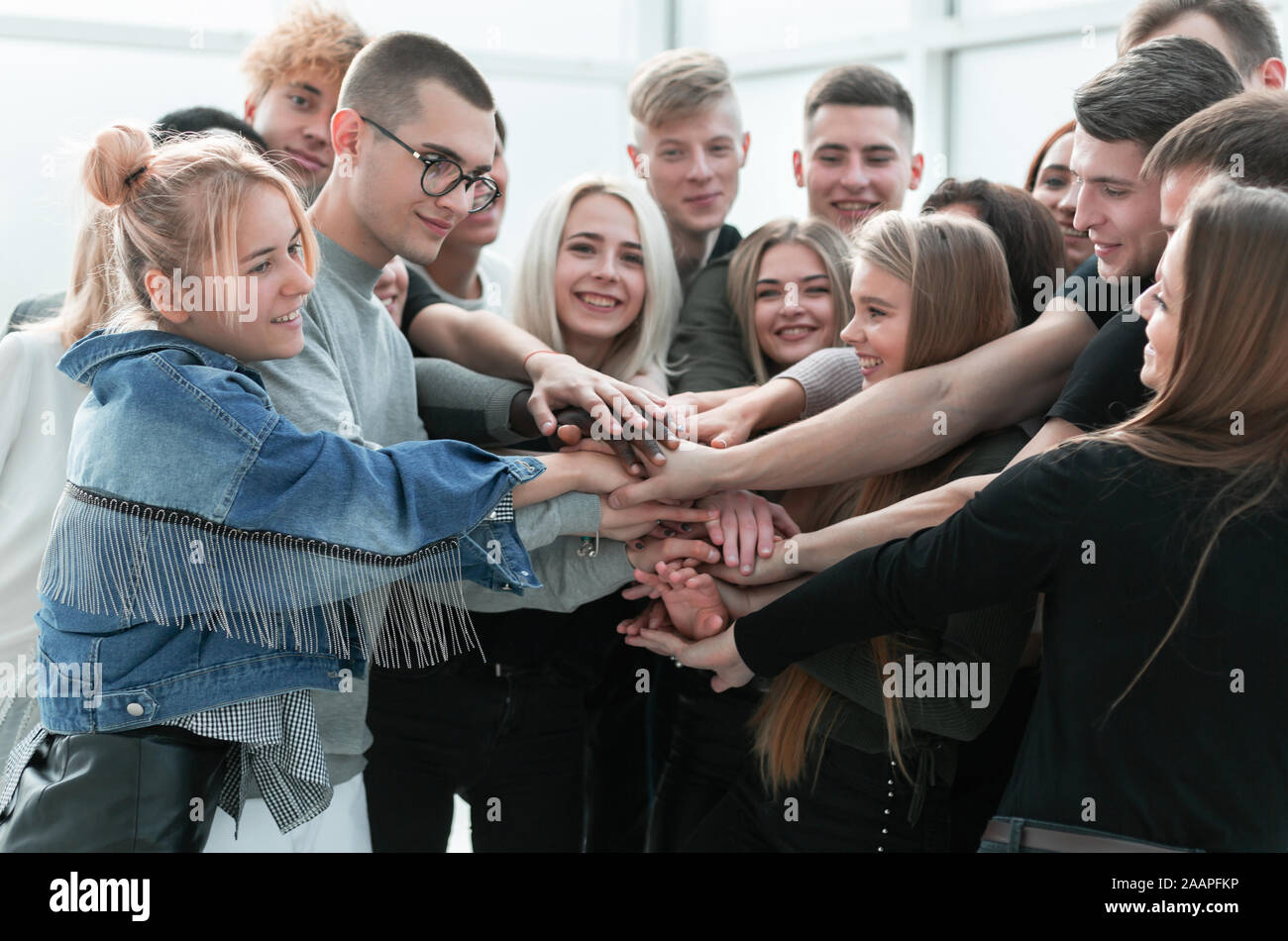 large group of young people showing their unity Stock Photo - Alamy