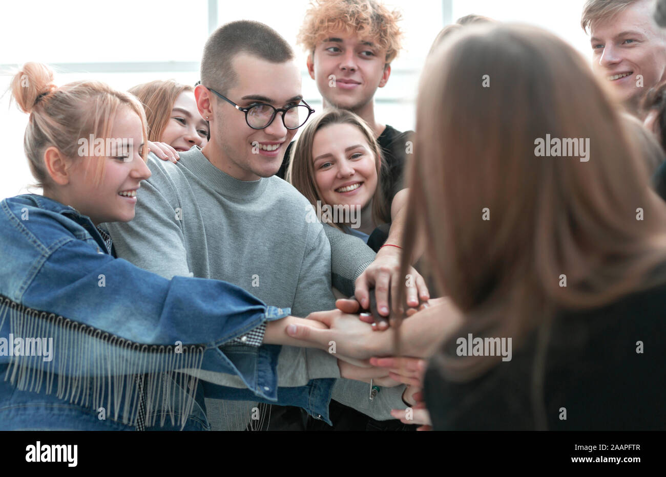 large group of young people showing their unity Stock Photo - Alamy