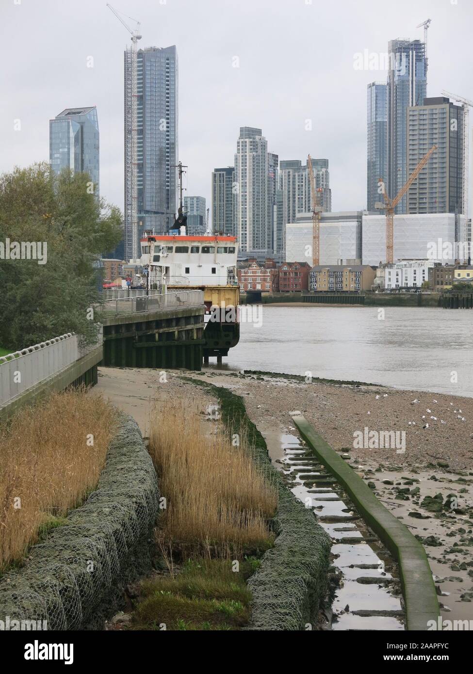View from the Thames Pathway in Greenwich looking across the river ...