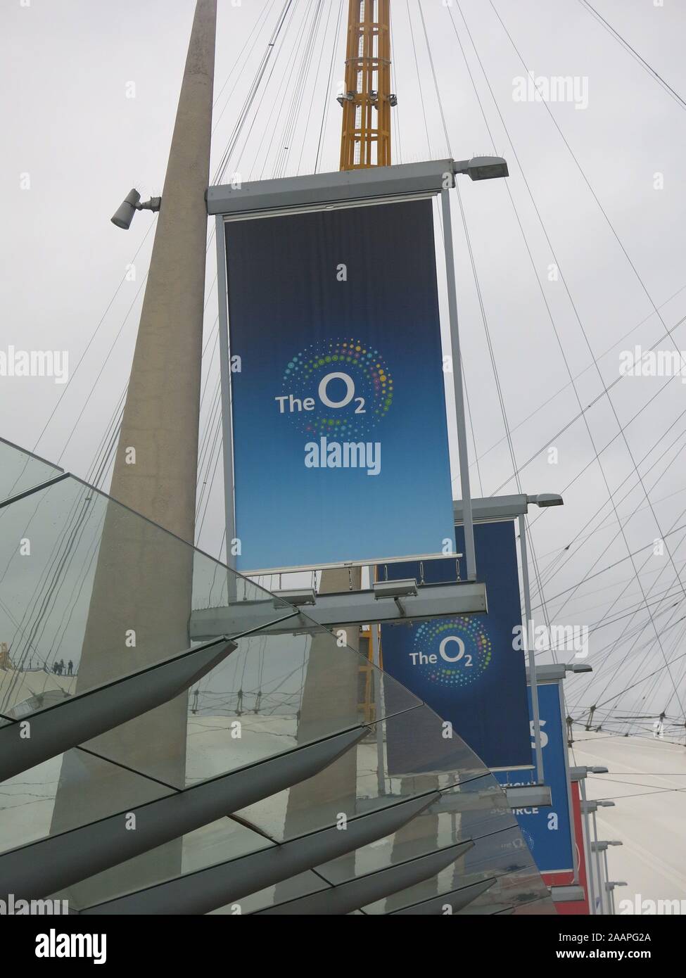 Tall banners with the logo of The O2 Arena hang above the structure of ...