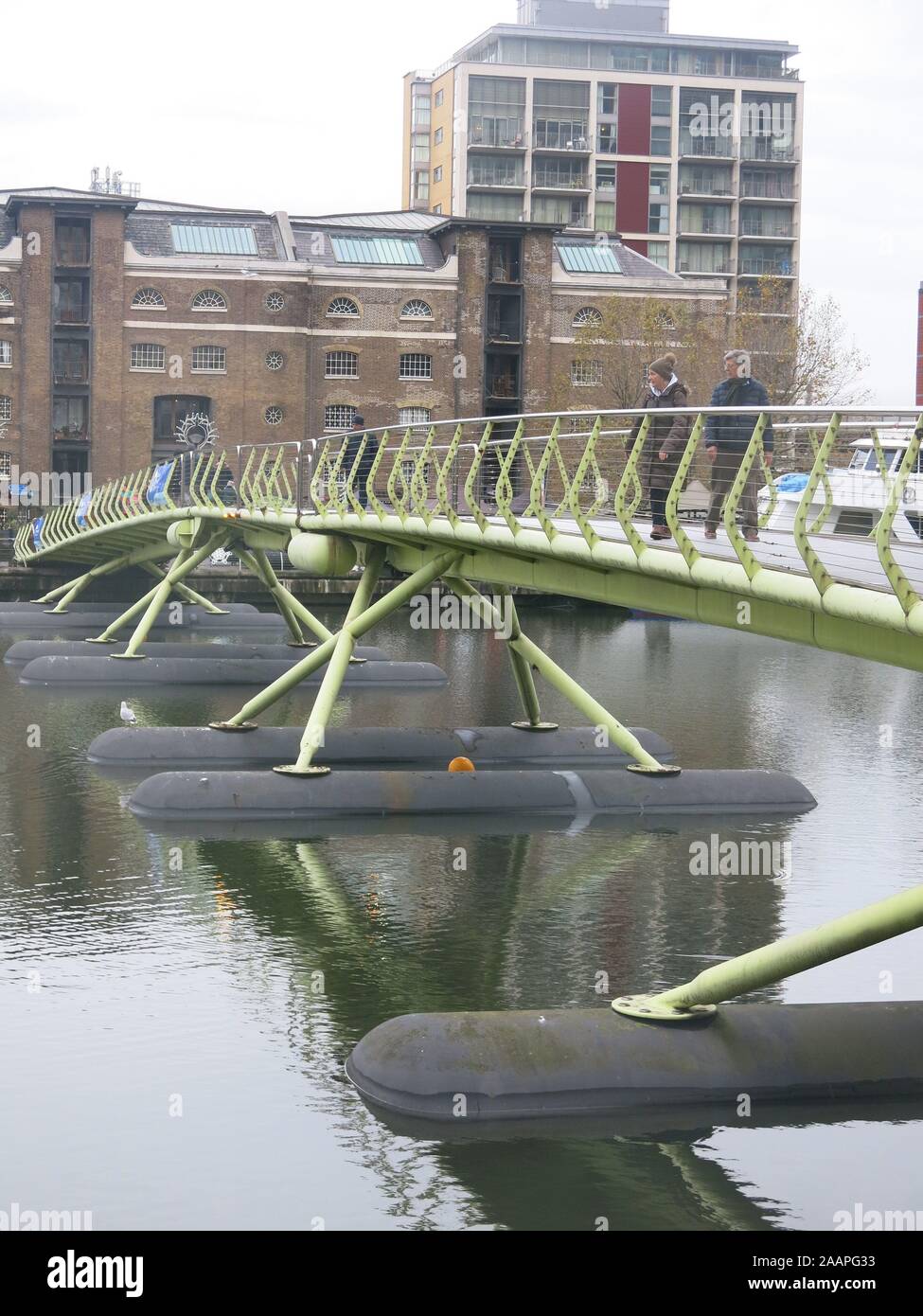 The floating pedestrian bridge at West India Quay, Canary Wharf, is a ...