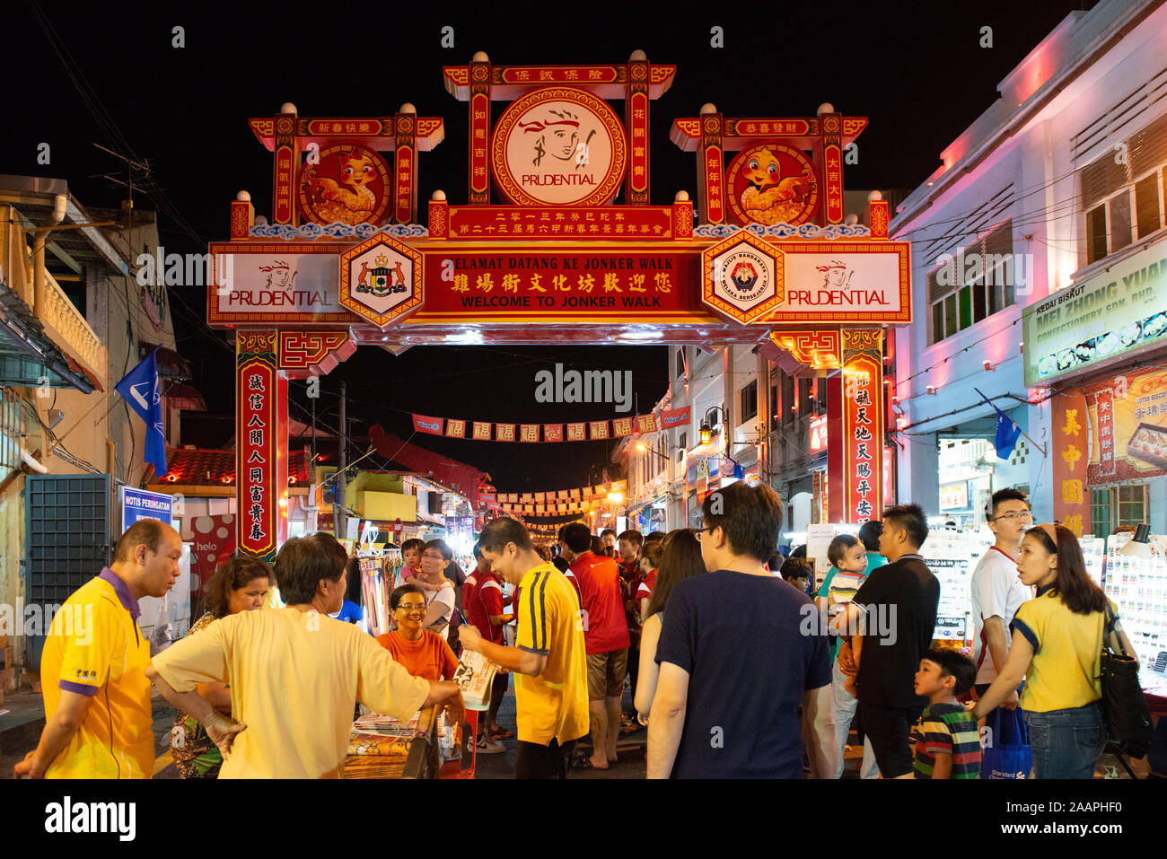 People walking through under the Chinese Arch during the weekend night ...