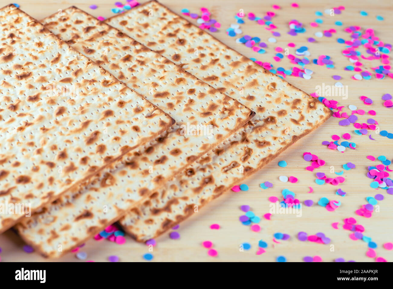 Passover celebration concept. Matzah and confetti happy colorful ...